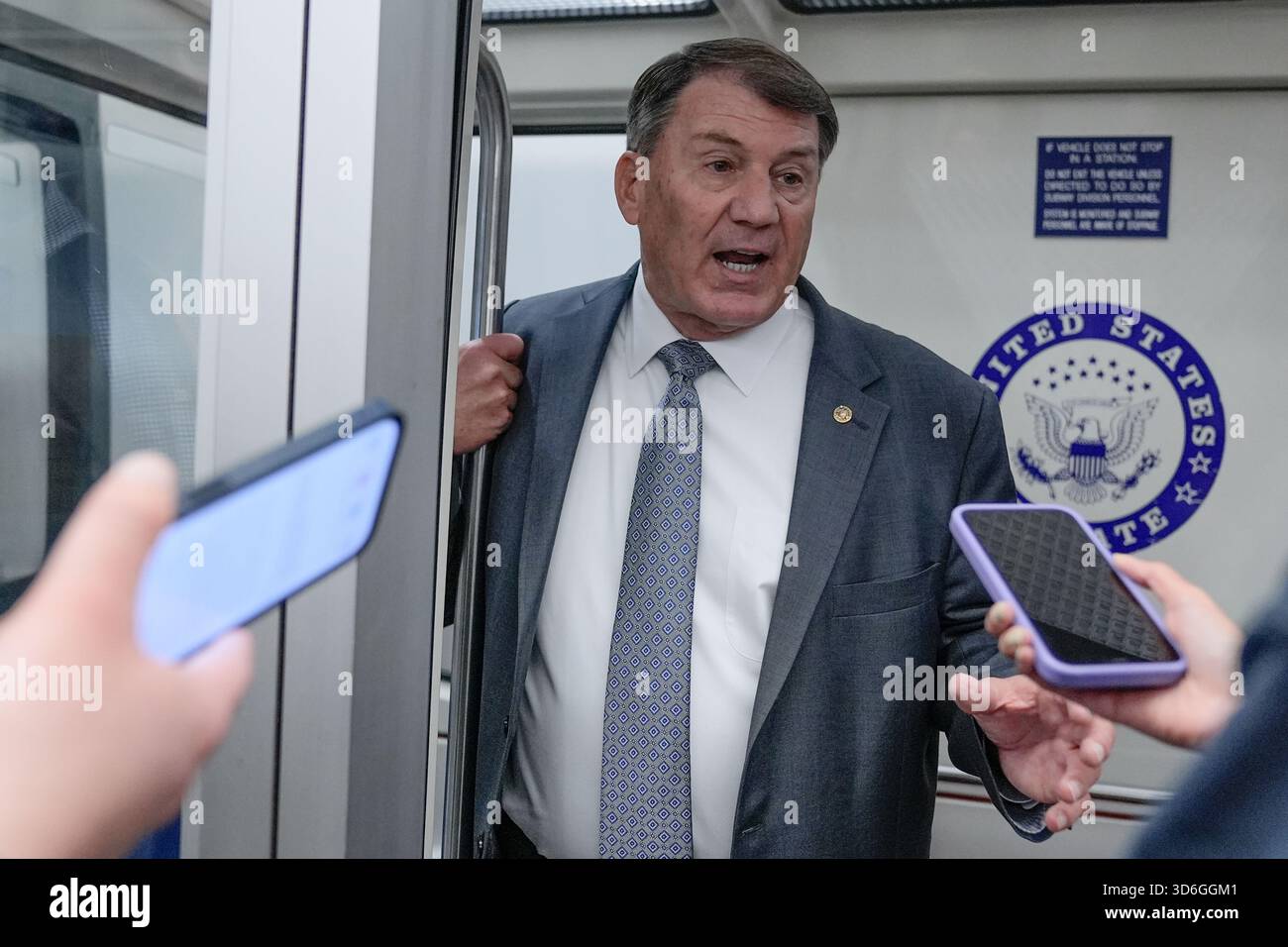 Sen. Mike Rounds, R-S.D., speaks with reporters on the Capitol subway ...