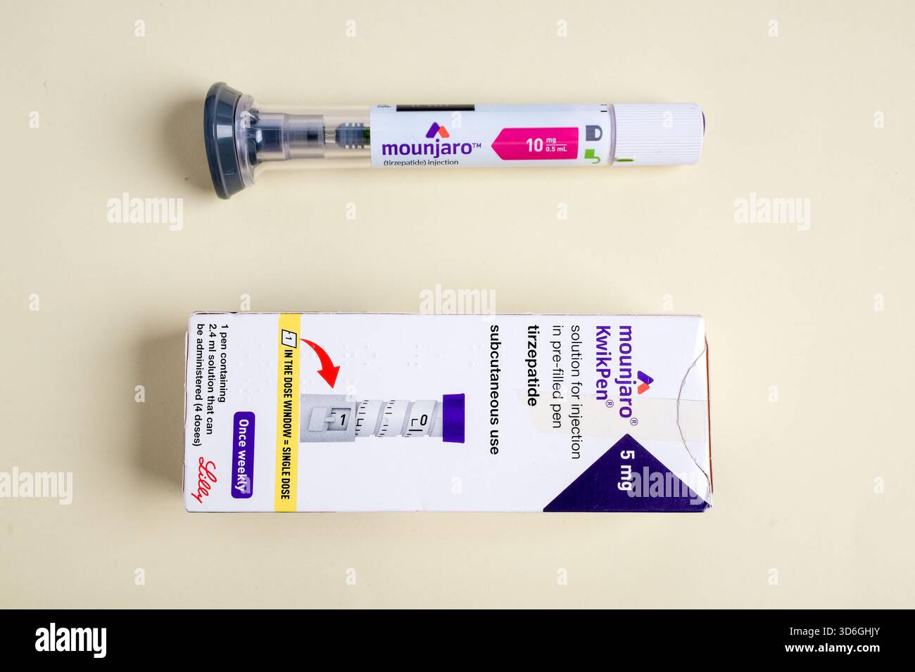 A mountjaro injection pen and its packaging, featuring a white and ...