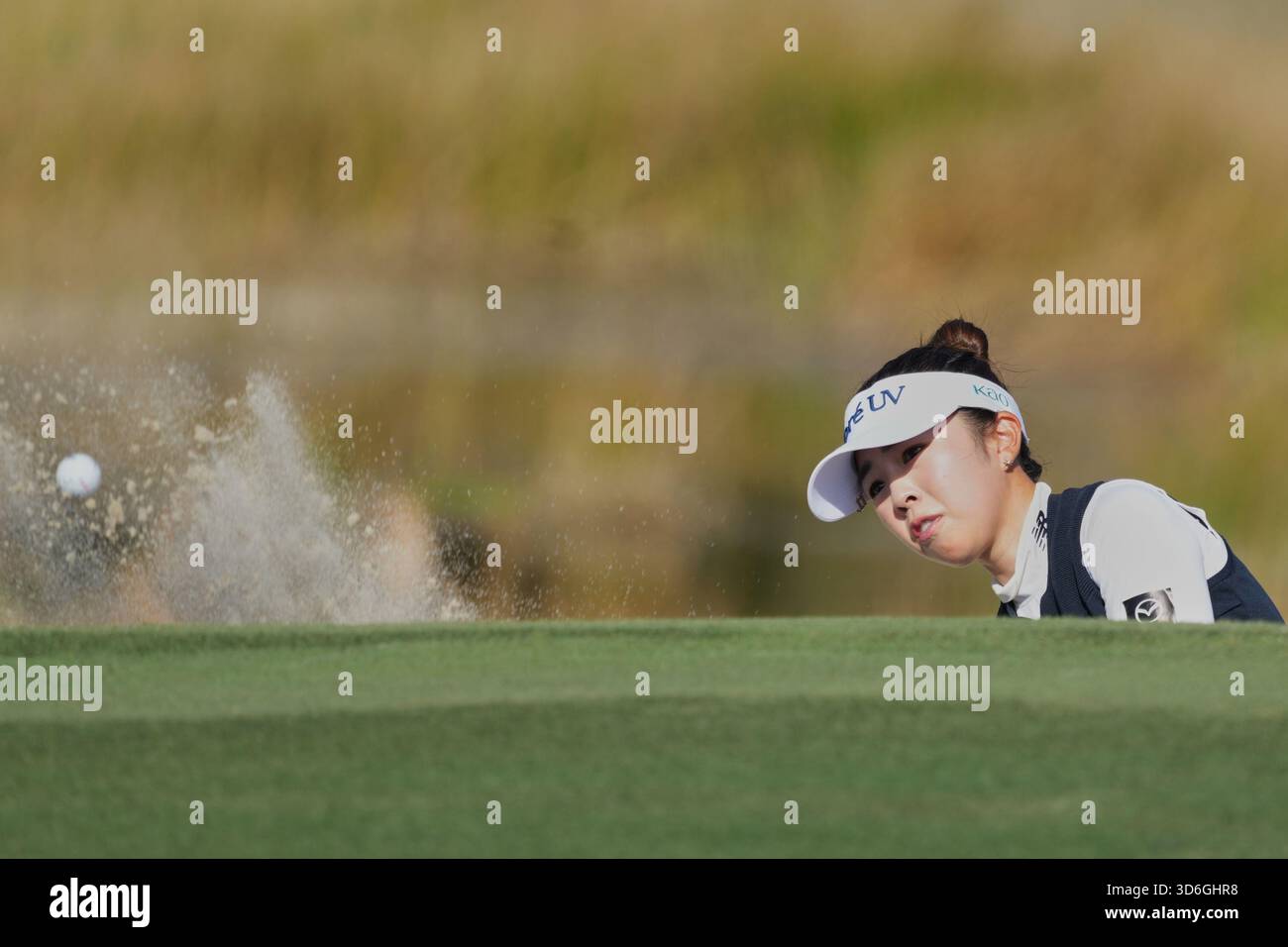 Miyu Yamashita of Japan hits from a sand trap on the ninth green during ...