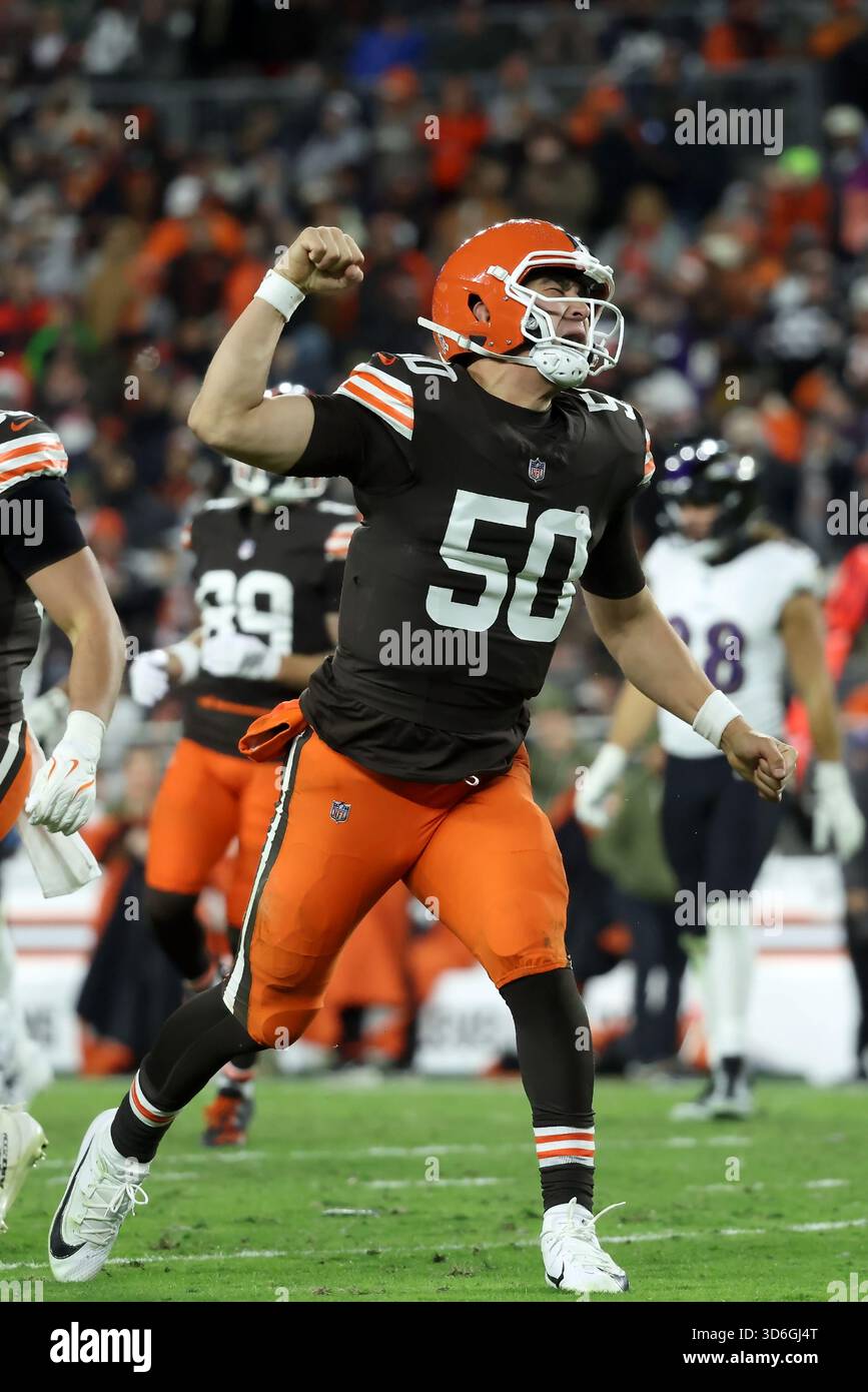 Cleveland Browns long snapper Rex Sunahara (50) rects after making a ...
