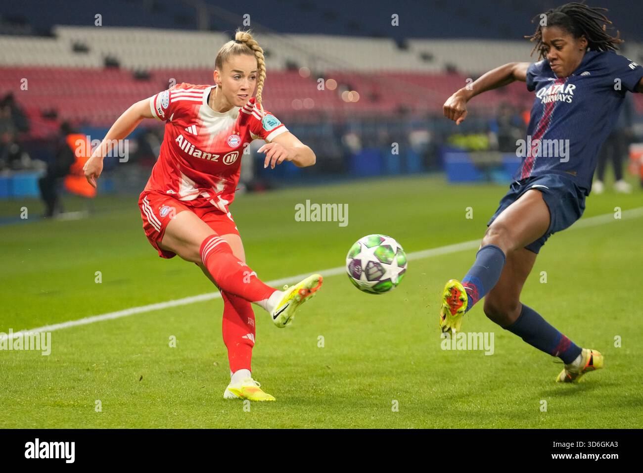 Bayern's Giulia Gwinn sends a cross by PSG's Jennifer Echegini during a ...