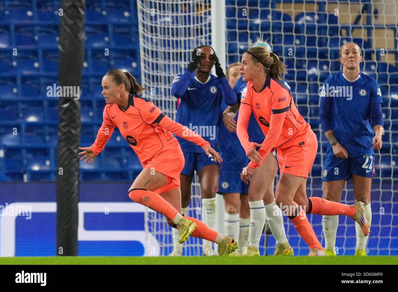 Barcelona's Ewa Pajor, left, celebrates after scoring her side's first ...