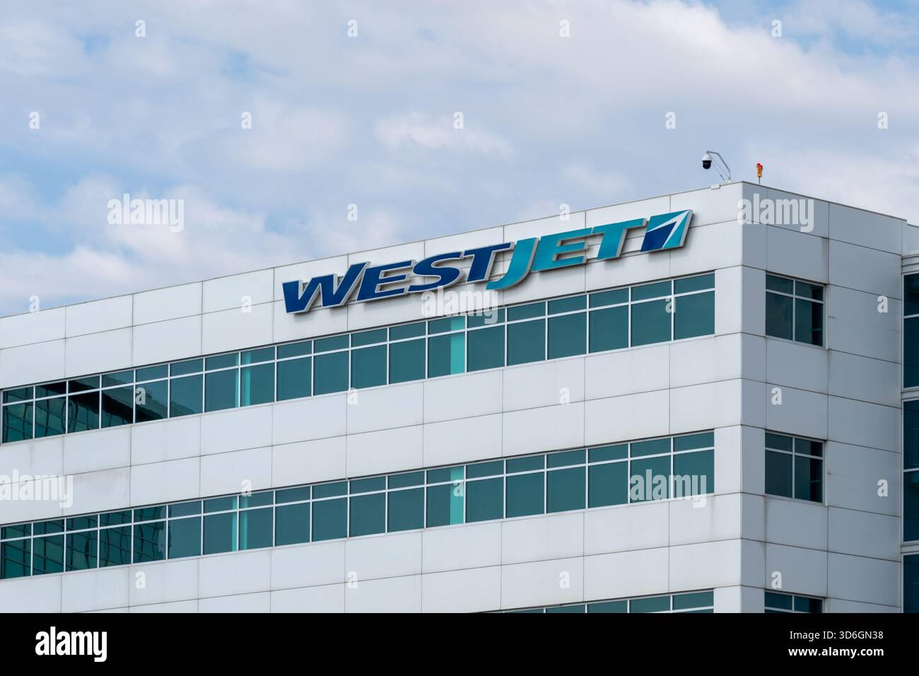 Close up of WestJet sign on the building at its World Headquarters in ...