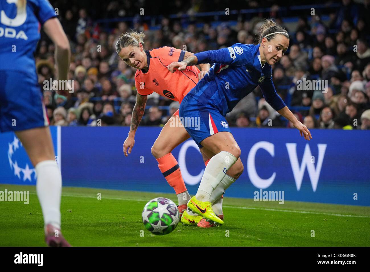 Chelsea's Lucy Bronze, right, vies for the ball with Barcelona's Mapi ...