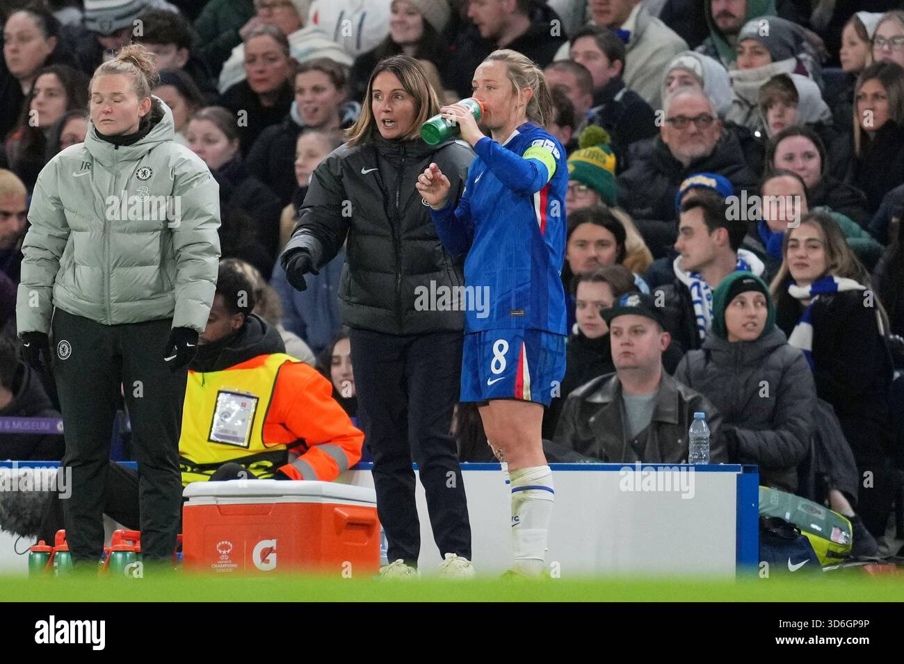 Chelsea coach Sonia Bompastor speaks to team captain Erin Cuthbert ...