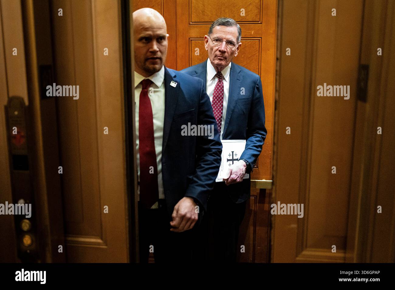 Senator John Barrasso (R-WY) boards an elevator at the U.S. Capitol, in ...