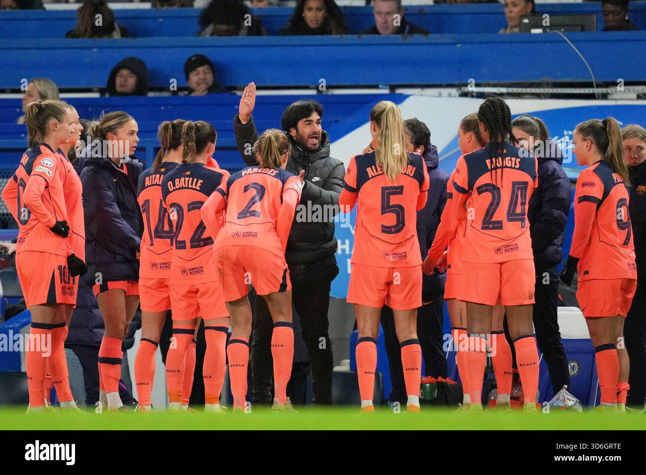 Barcelona coach Pere Romeu speaks to the players during the women's ...