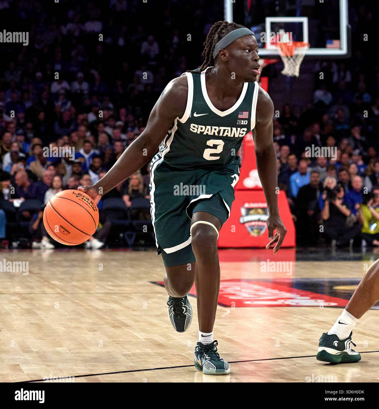 Michigan State Spartans guard Kur Teng (2) brings the ball up court ...