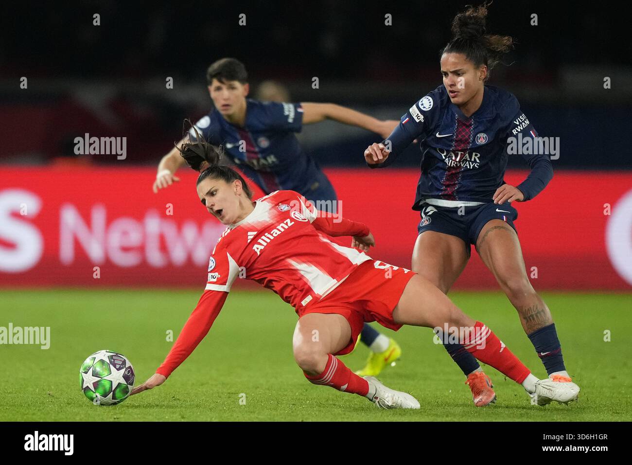 Bayern's Jovana Damnjanovic falls in front of PSG's Isabela Chagas ...