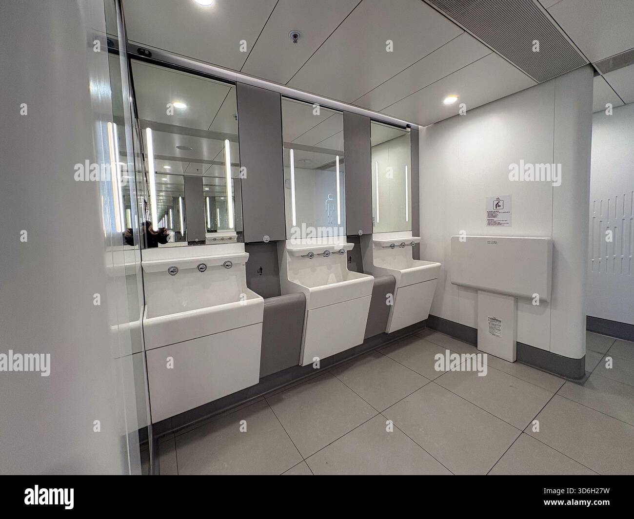 Modern public restroom at Hong Kong International Airport featuring ...