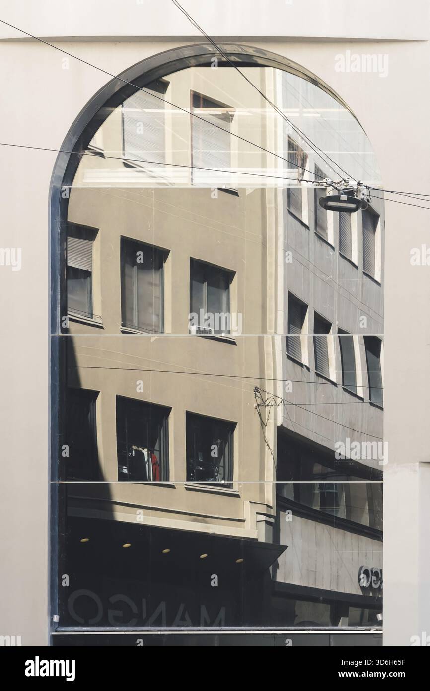 Abstract fragment of old building architecture reflected in modern ...