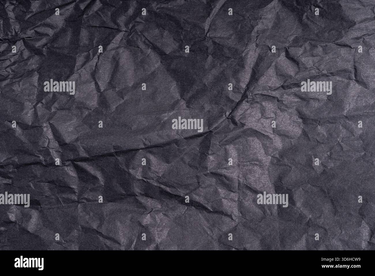Dark wrinkled creased black paper poster texture. Blank creased ...