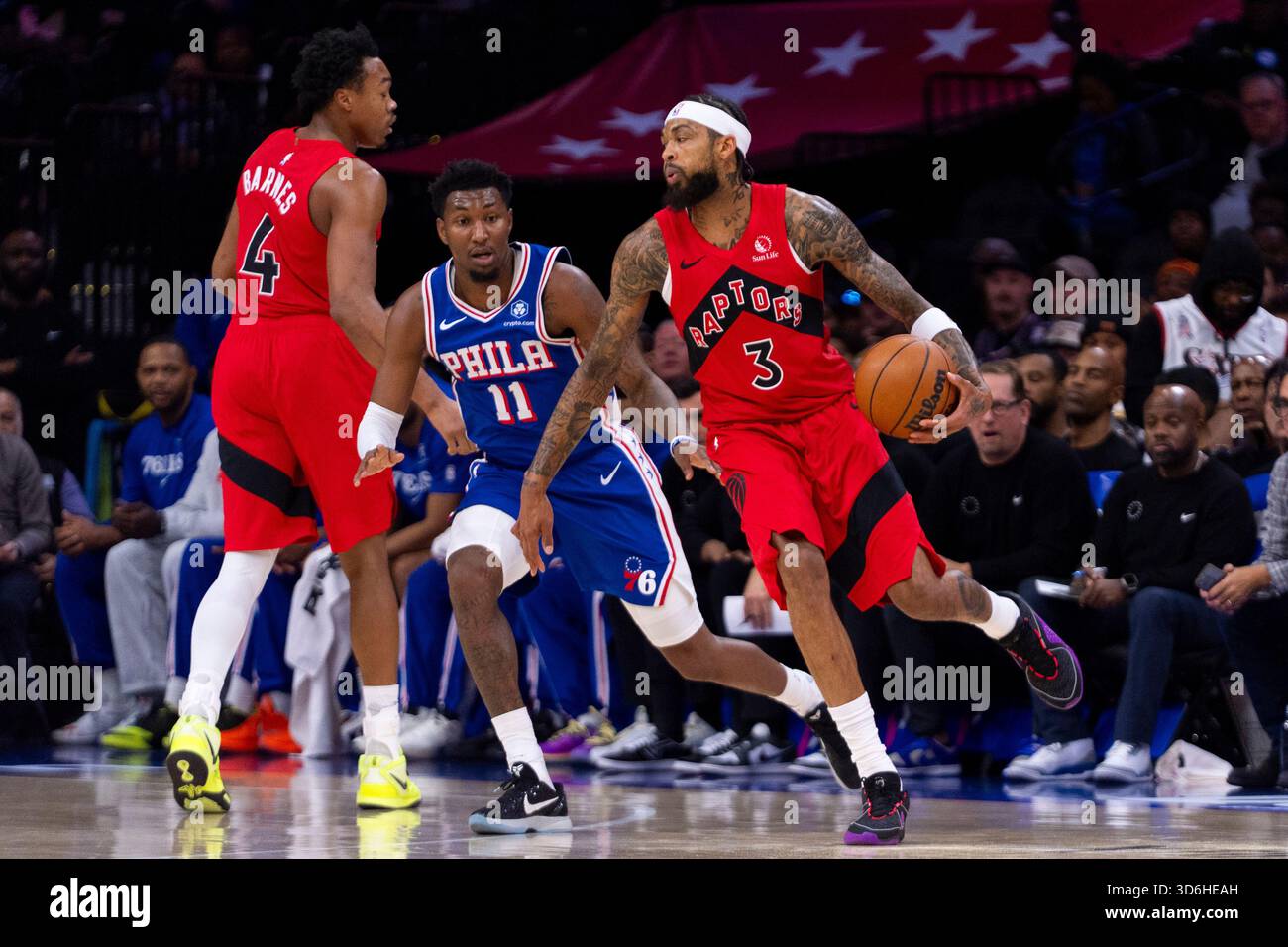 Toronto Raptors' Brandon Ingram, right, in action against Philadelphia 76ers' Justin Edwards ...