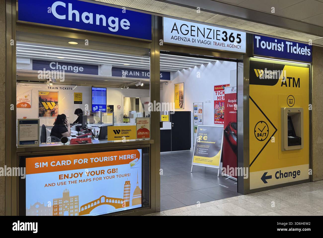 Milan, Italy - April, 07, 2025: Travel agency, currency exchange, SIM ...