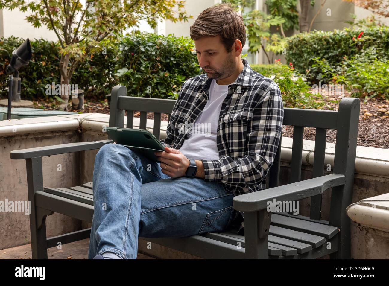 Man in a plaid shirt hi-res stock photography and images - Alamy