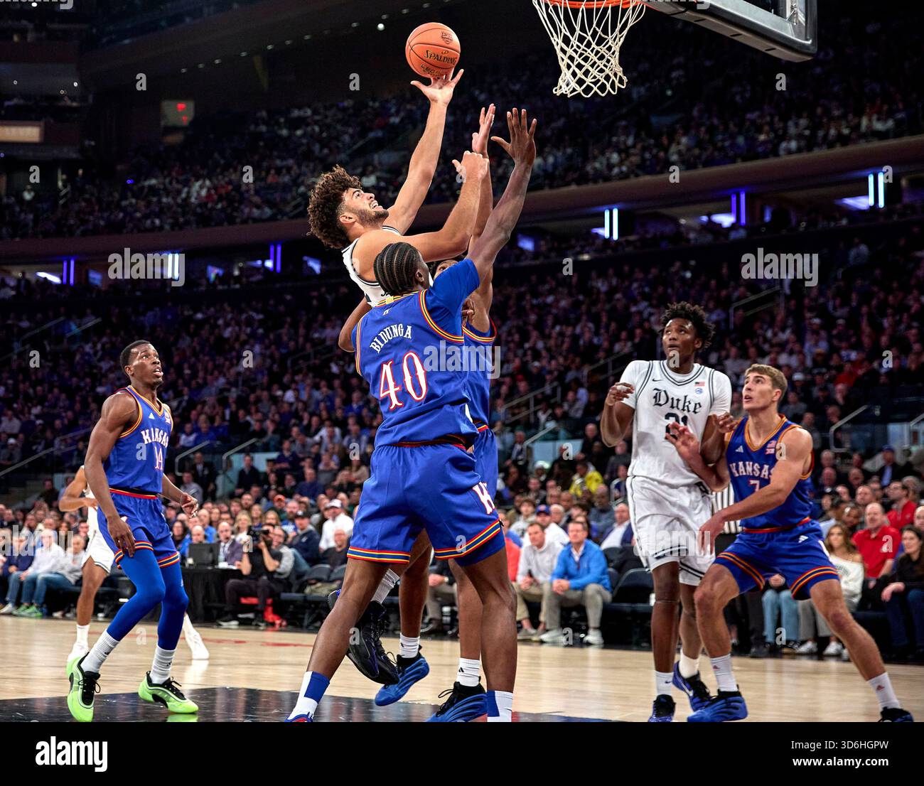 Duke Blue Devils forward Cameron Boozer (12) shoots over Kansas ...