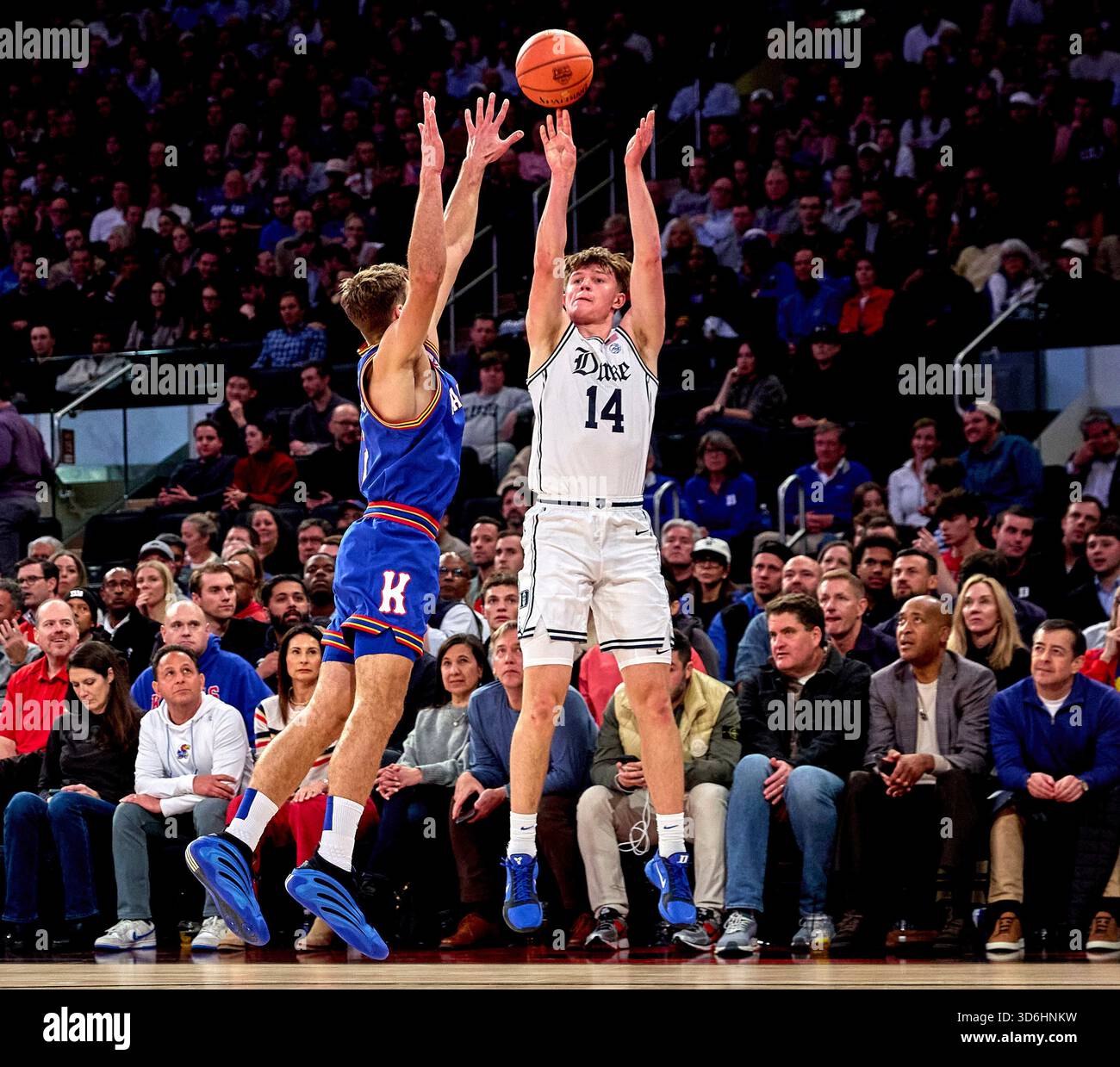 Duke Blue Devils guard Nikolas Khamenia (14) shoots against Kansas ...