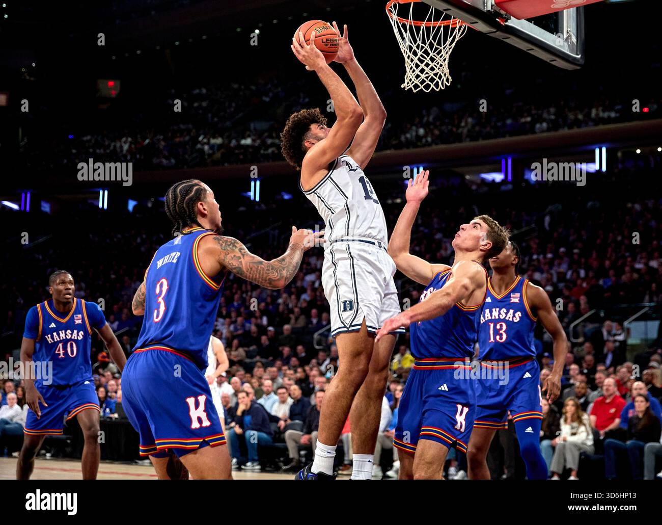 Duke Blue Devils forward Cameron Boozer (12) shoots over Kansas ...