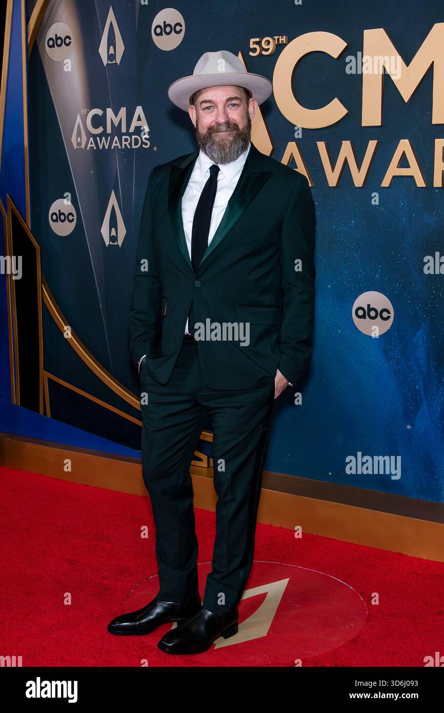 Kristian Bush walks the red carpet before the “The 59th Annual CMA ...