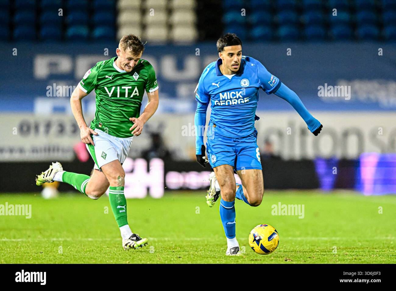 Brandon Khela (8 Peterborough United) goes forward with the ball during ...