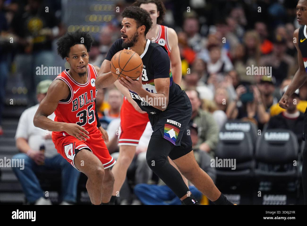 Denver Nuggets forward Cameron Johnson (23) and Chicago Bulls forward ...
