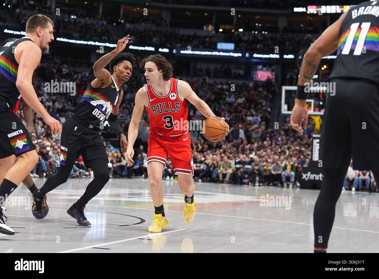 Chicago Bulls guard Josh Giddey (3) drives to the rim as Denver Nuggets ...