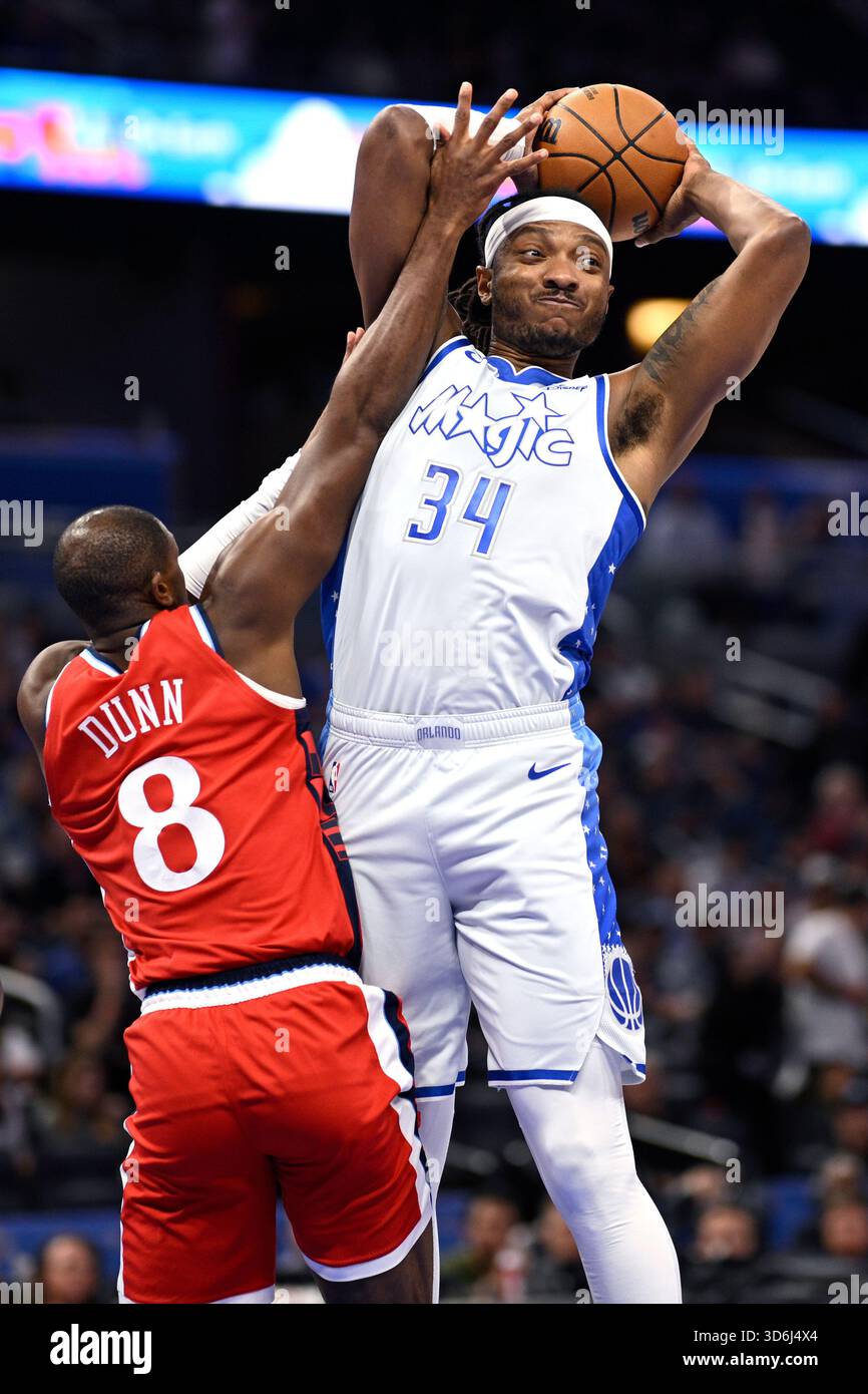 Orlando Magic center Wendell Carter Jr. (34) grabs a rebound in front ...