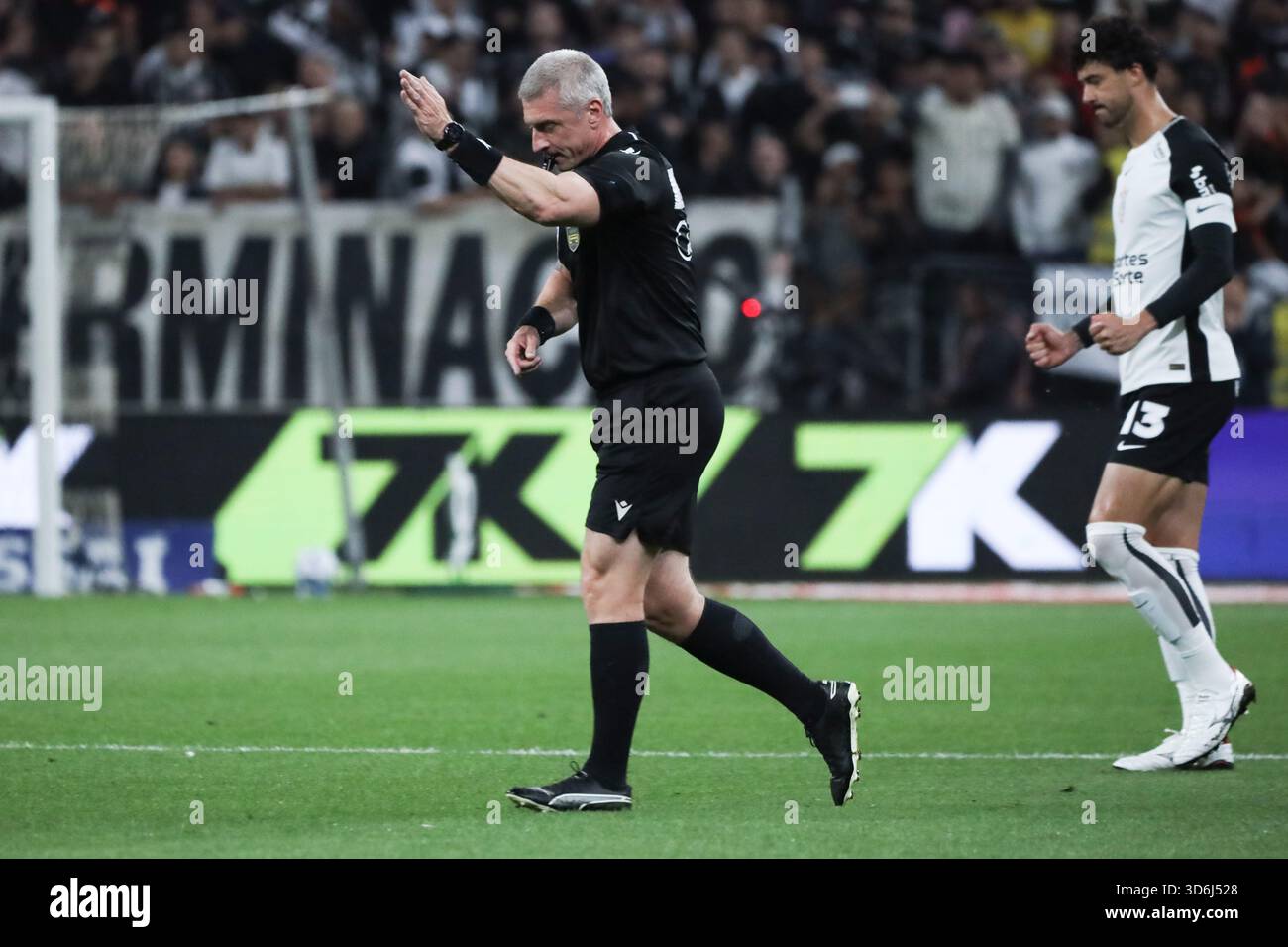 Referee Anderson Daronco awards a penalty to Corinthians during the ...