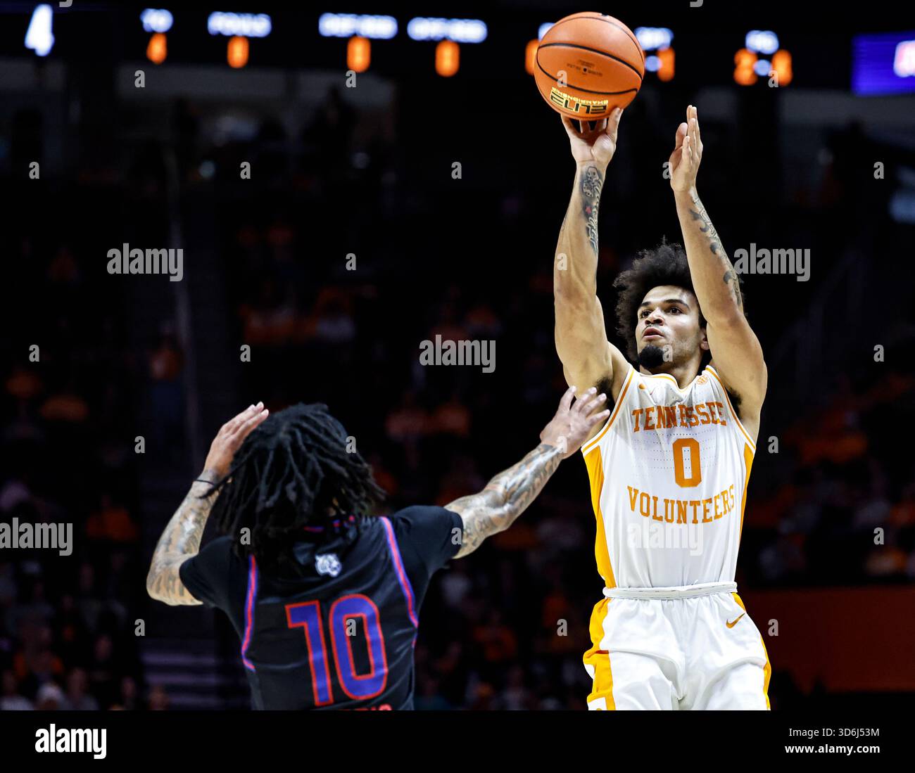 Tennessee guard Ja'Kobi Gillespie (0) shoots over Tennessee State guard ...