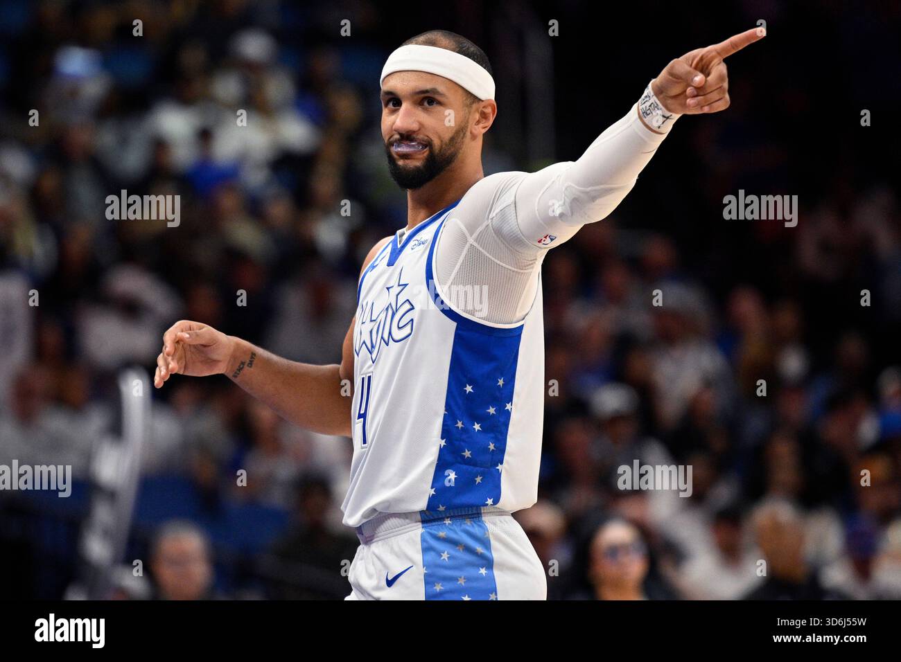 Orlando Magic guard Jalen Suggs reacts after a play against the Los ...