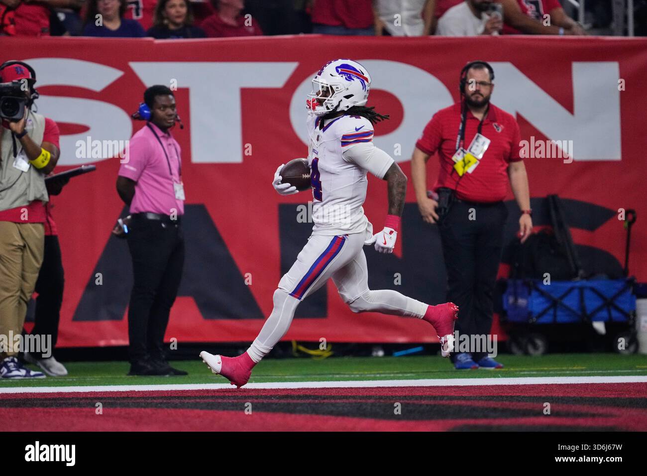 Buffalo Bills running back James Cook III (4) runs the ball for a ...