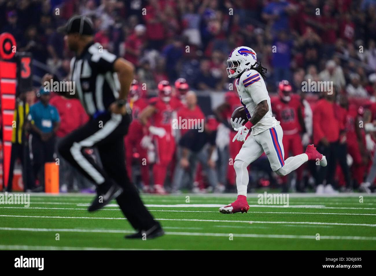 Buffalo Bills running back James Cook III (4) runs the ball for a ...