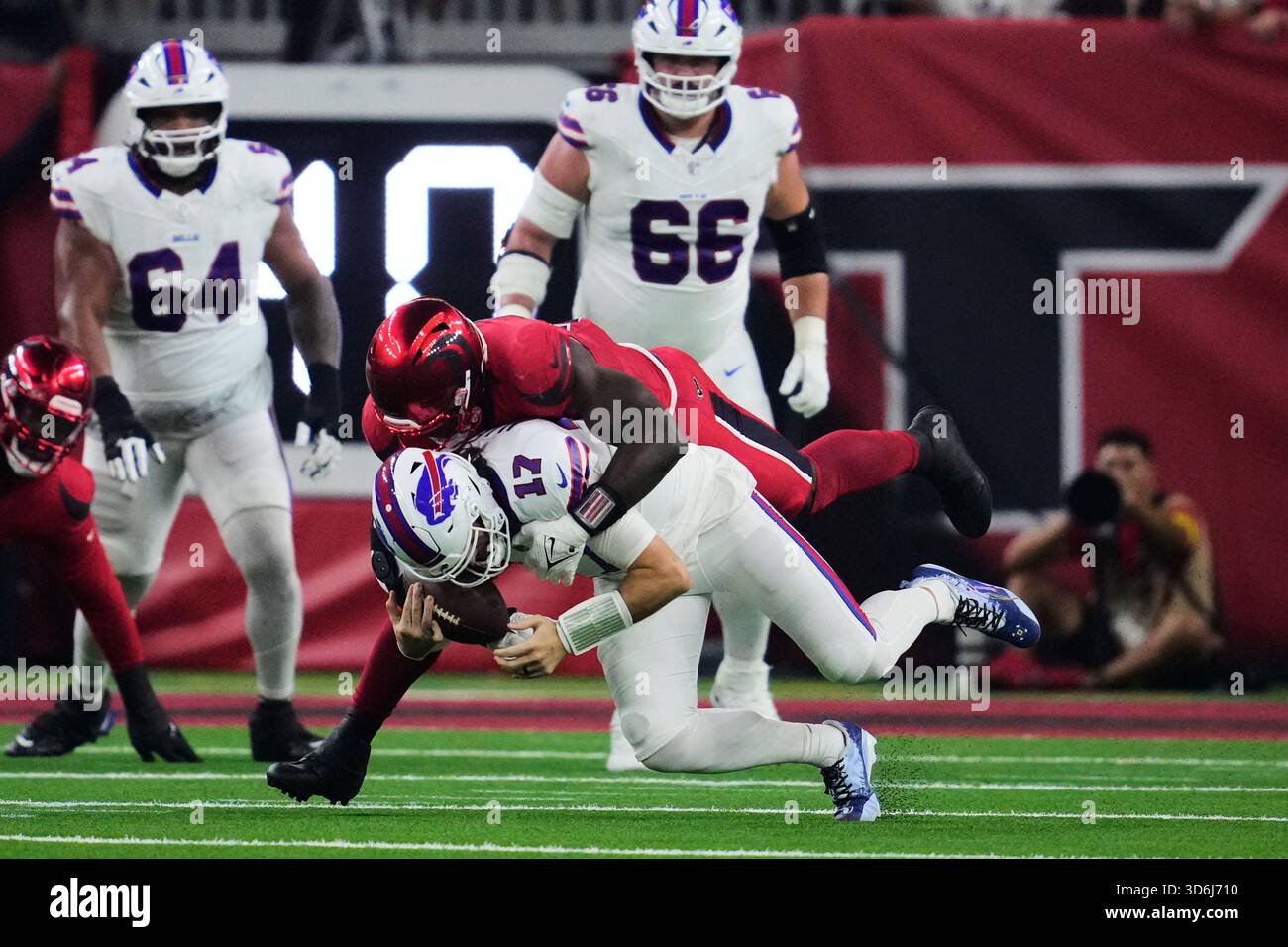 Buffalo Bills quarterback Josh Allen (17) is sacked by Houston Texans ...