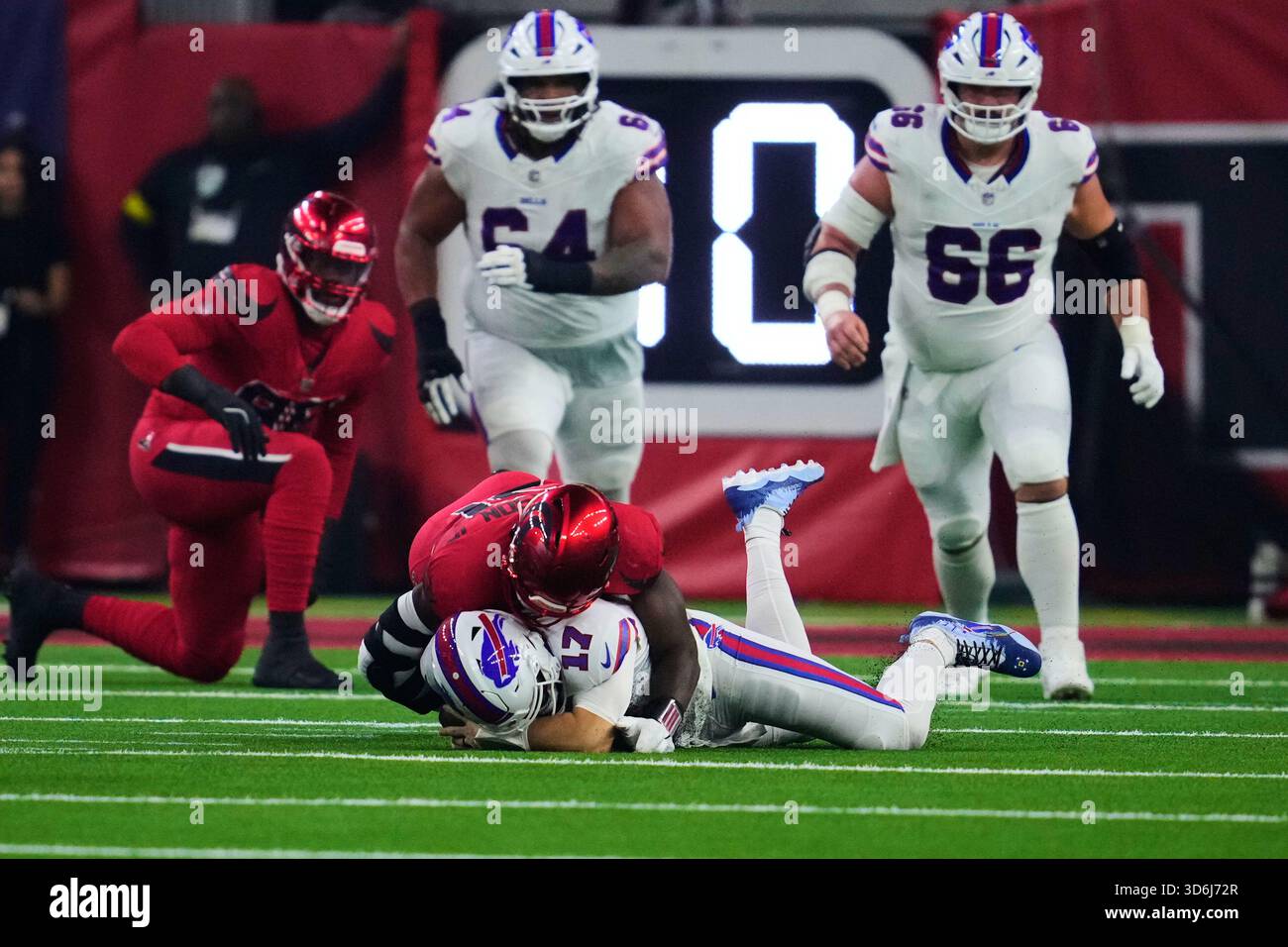 Buffalo Bills quarterback Josh Allen (17) is sacked by Houston Texans ...