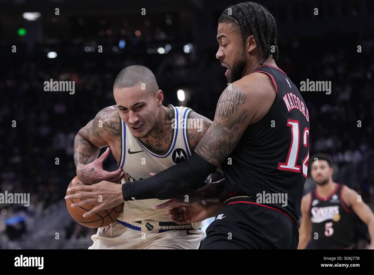 Philadelphia 76ers' Trendon Watford knocks the ball from Milwaukee ...