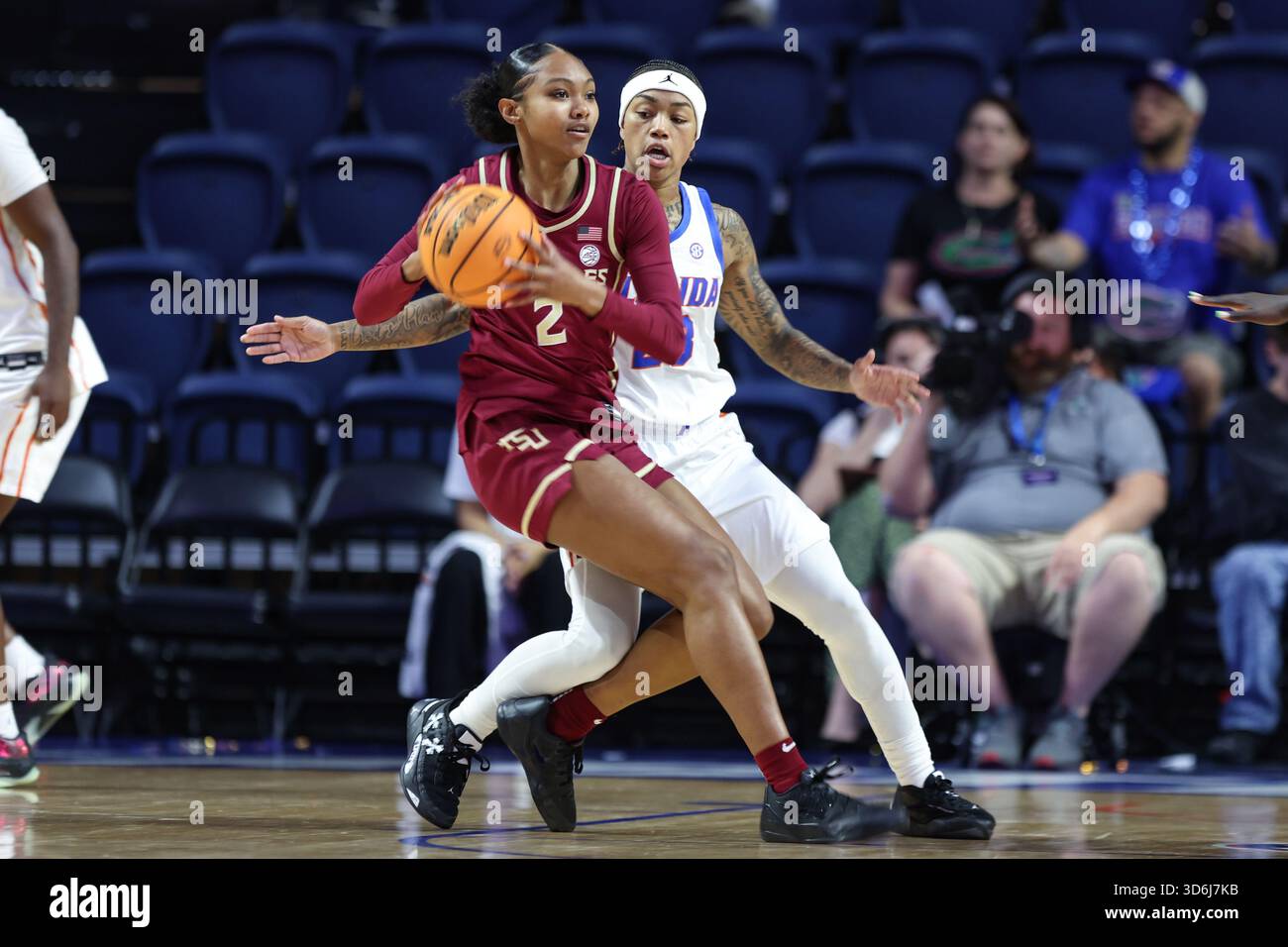 Florida State guard Amaya Bonner (2) works the ball toward the basket ...