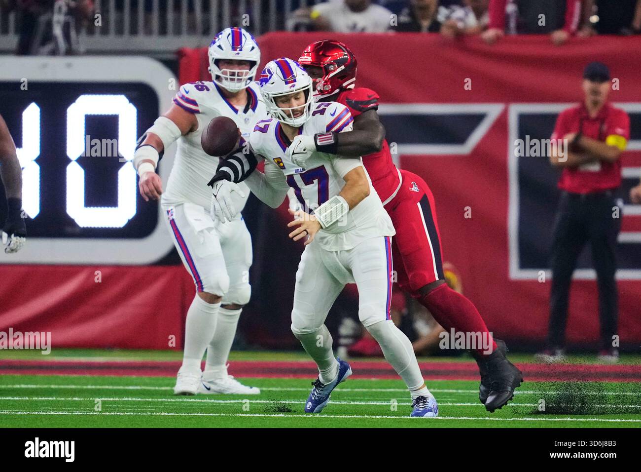 Buffalo Bills quarterback Josh Allen (17) is sacked by Houston Texans ...