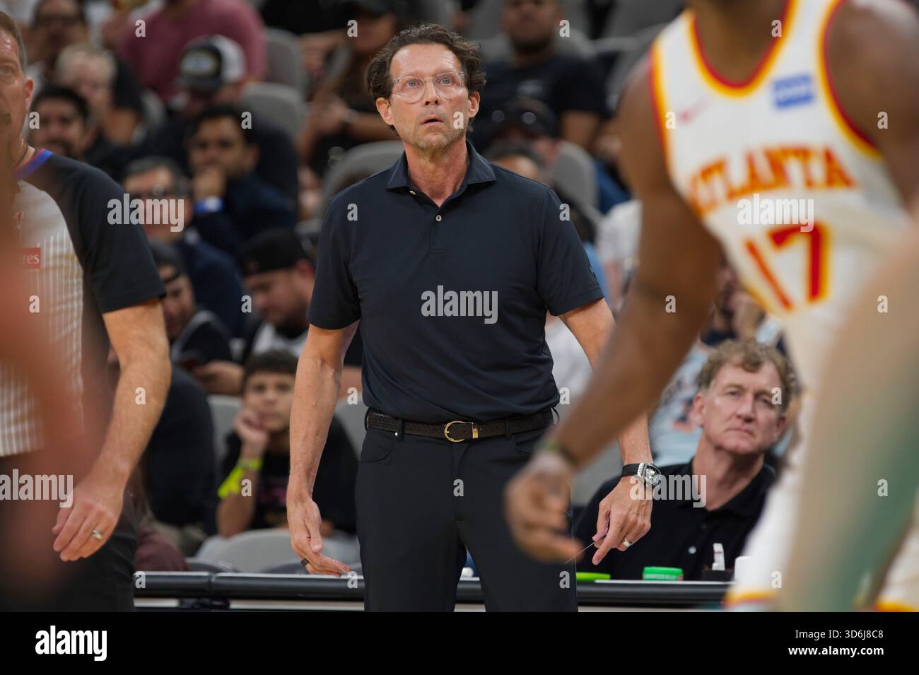 Atlanta Hawks head coach Quin Snyder watches the first half of an NBA ...