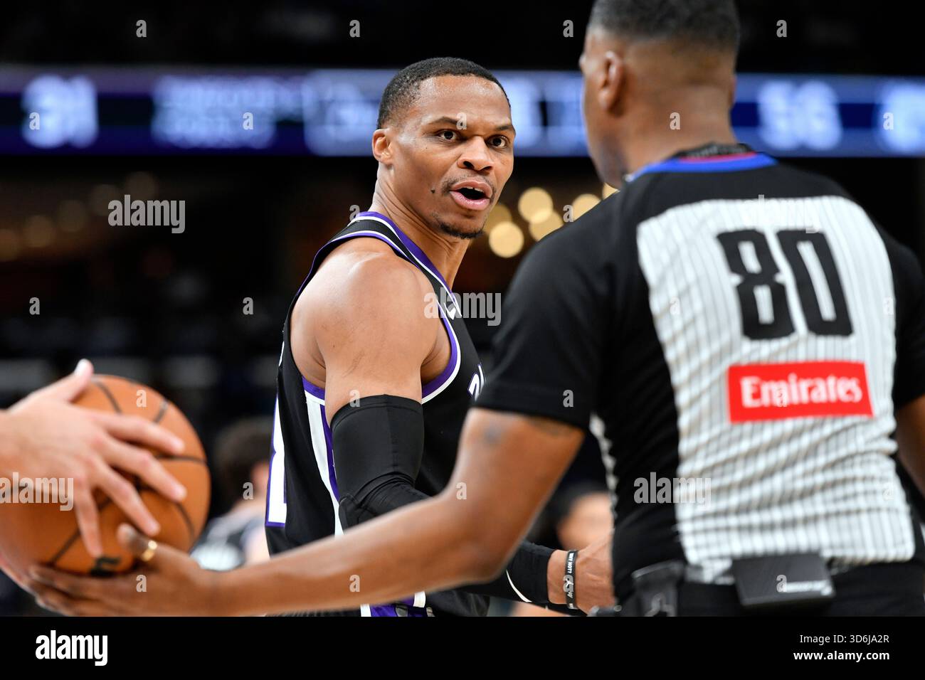 Sacramento Kings guard Russell Westbrook, left, reacts after a call by ...