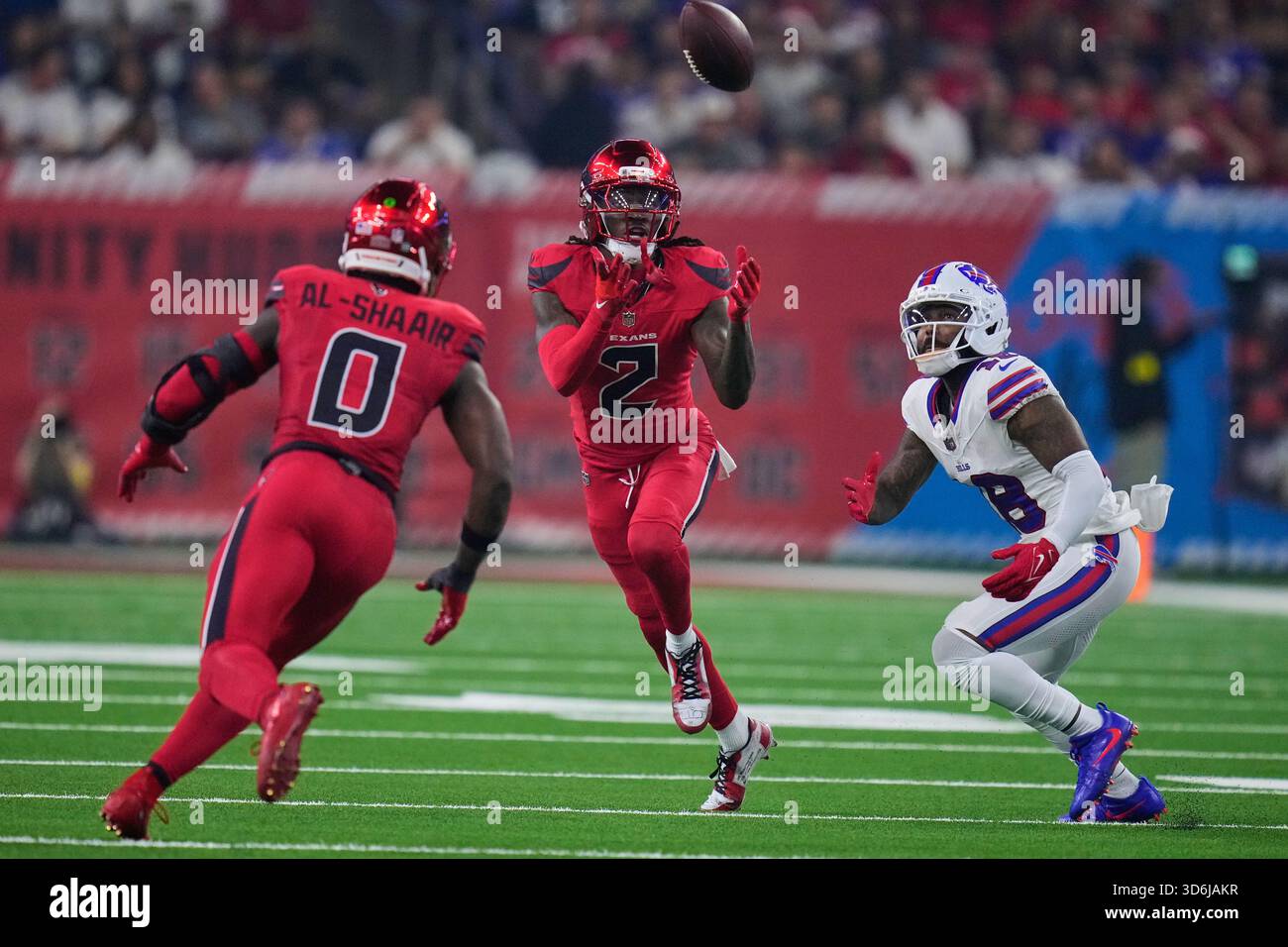 Houston Texans safety Calen Bullock (2) intercepts a pass as Azeez Al ...