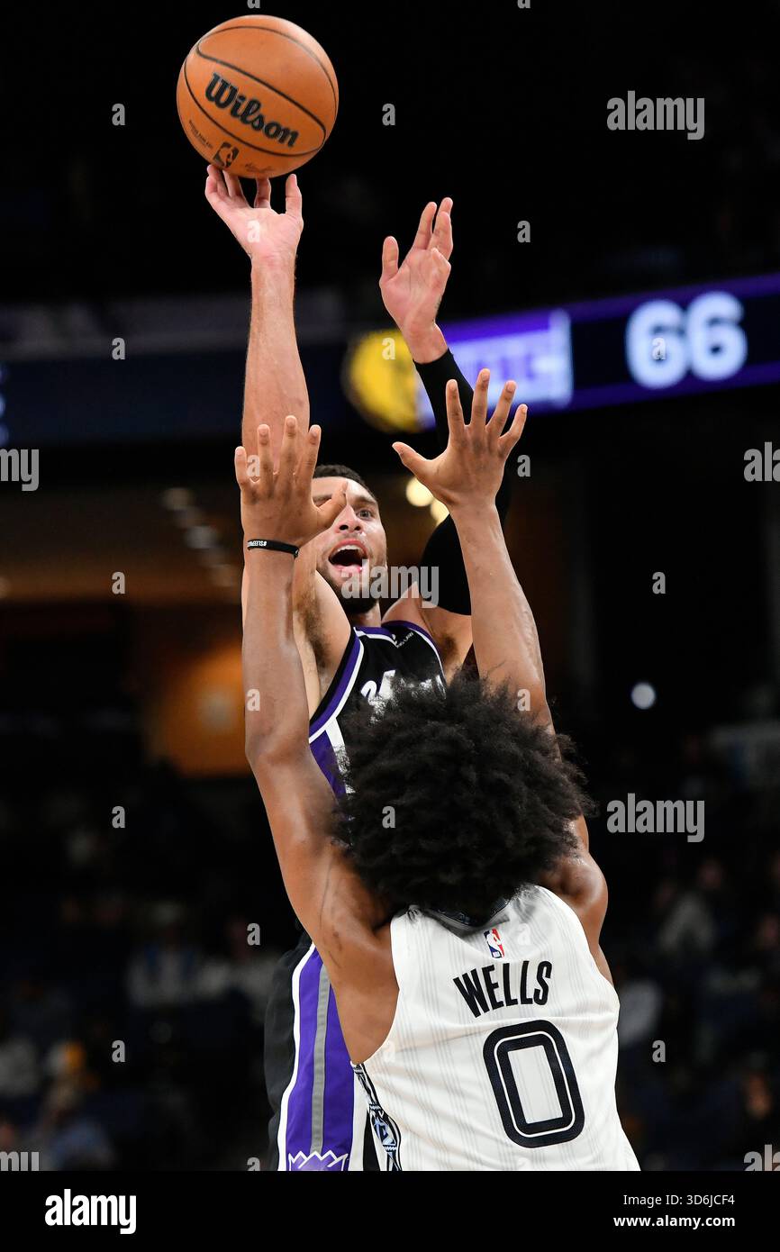 Sacramento Kings guard Zach LaVine, top, shoots over Memphis Grizzlies ...