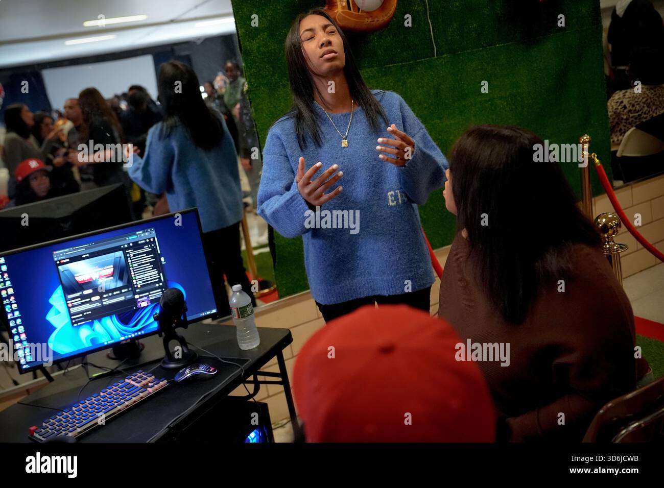 Mo'ne Davis takes a moment at her watch party before the beginning of ...