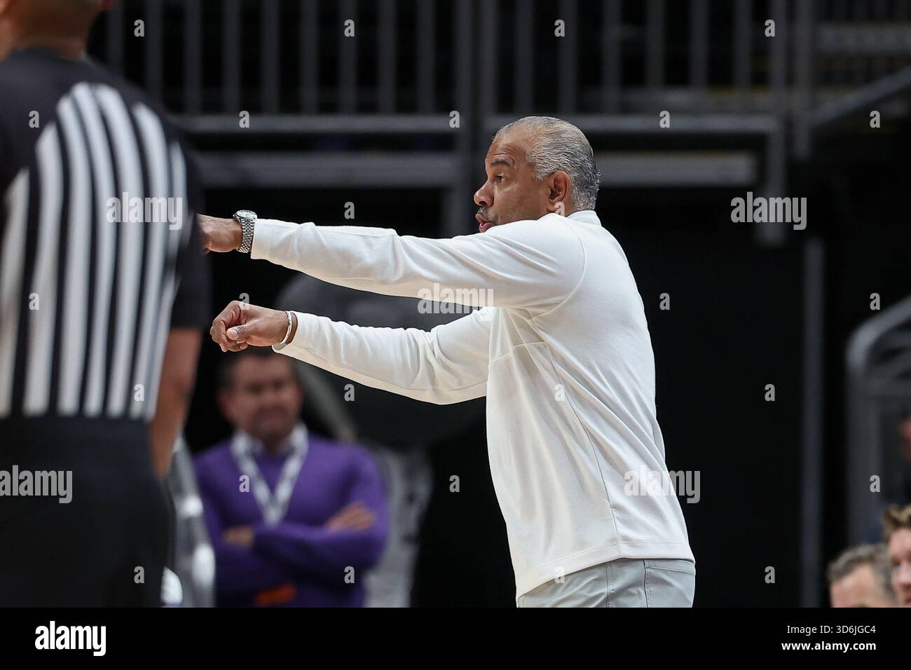 November 20, 2025: Kansas State Wildcats head coach Jerome Tang directs ...