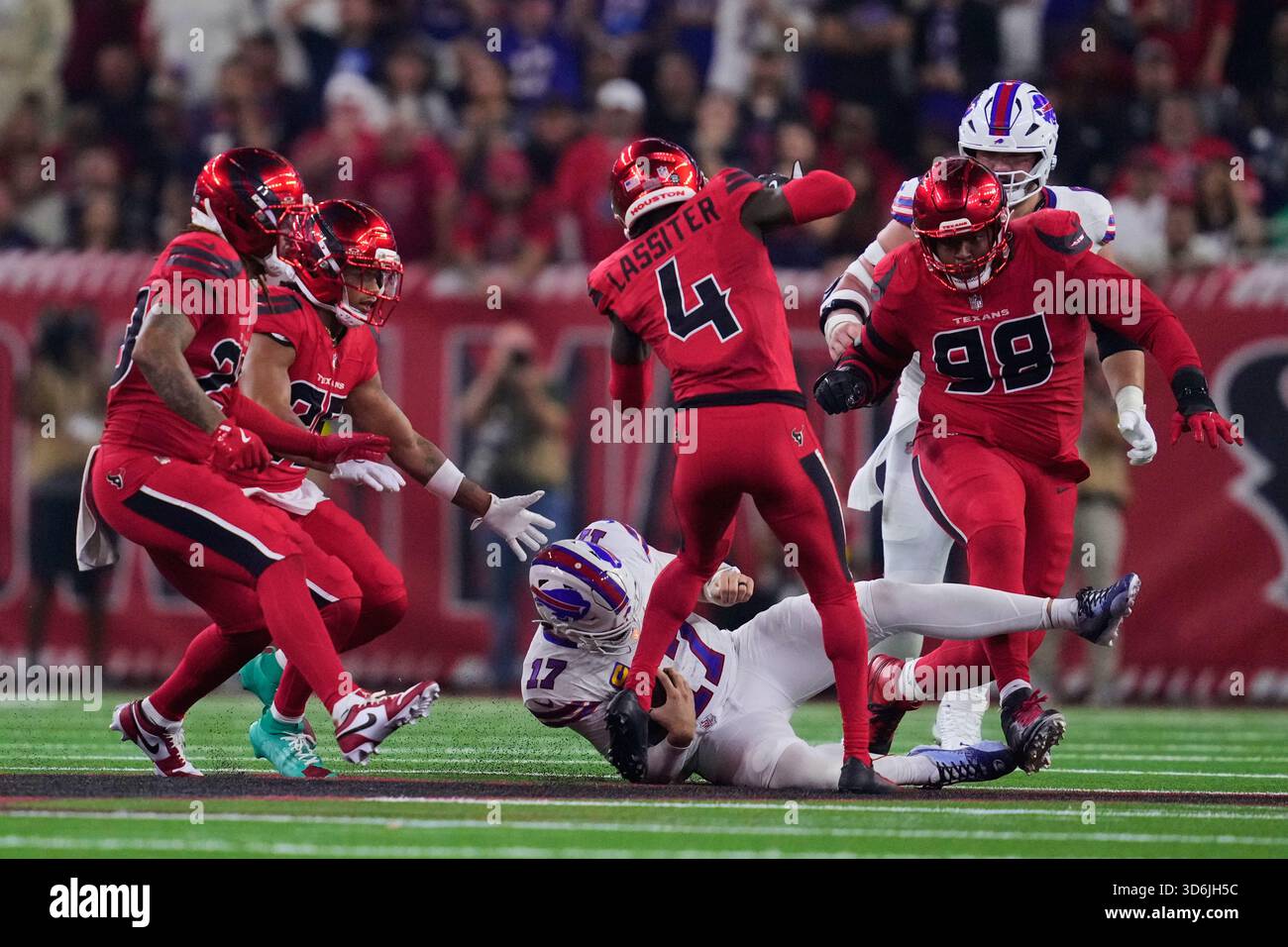 Buffalo Bills quarterback Josh Allen (17) slides to a stop under ...