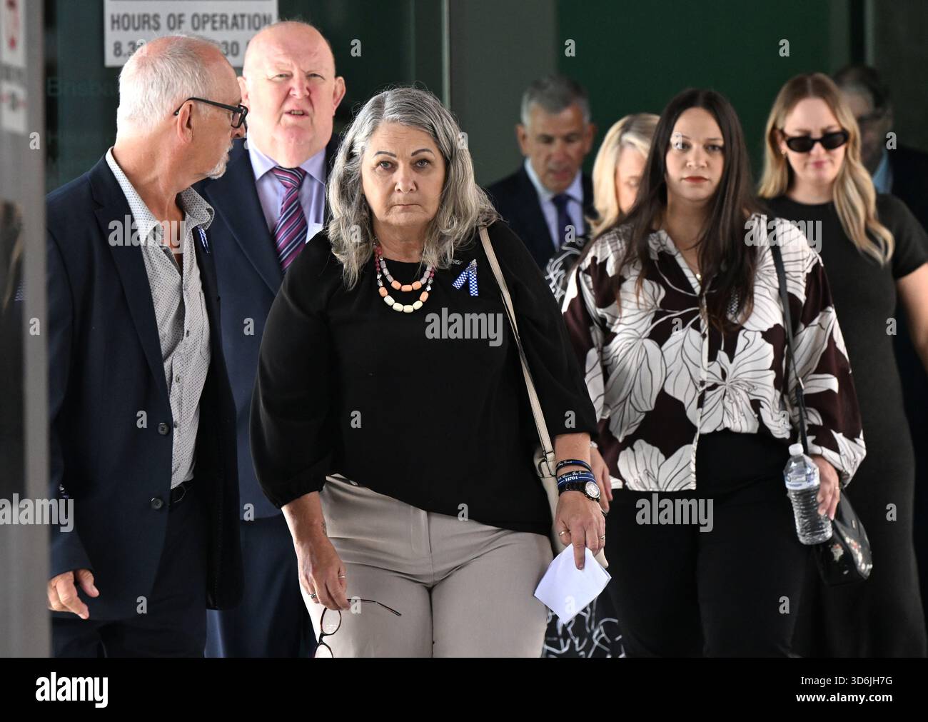 Judy McCrow (centre), mother of Rachel McCrow is seen with family ...
