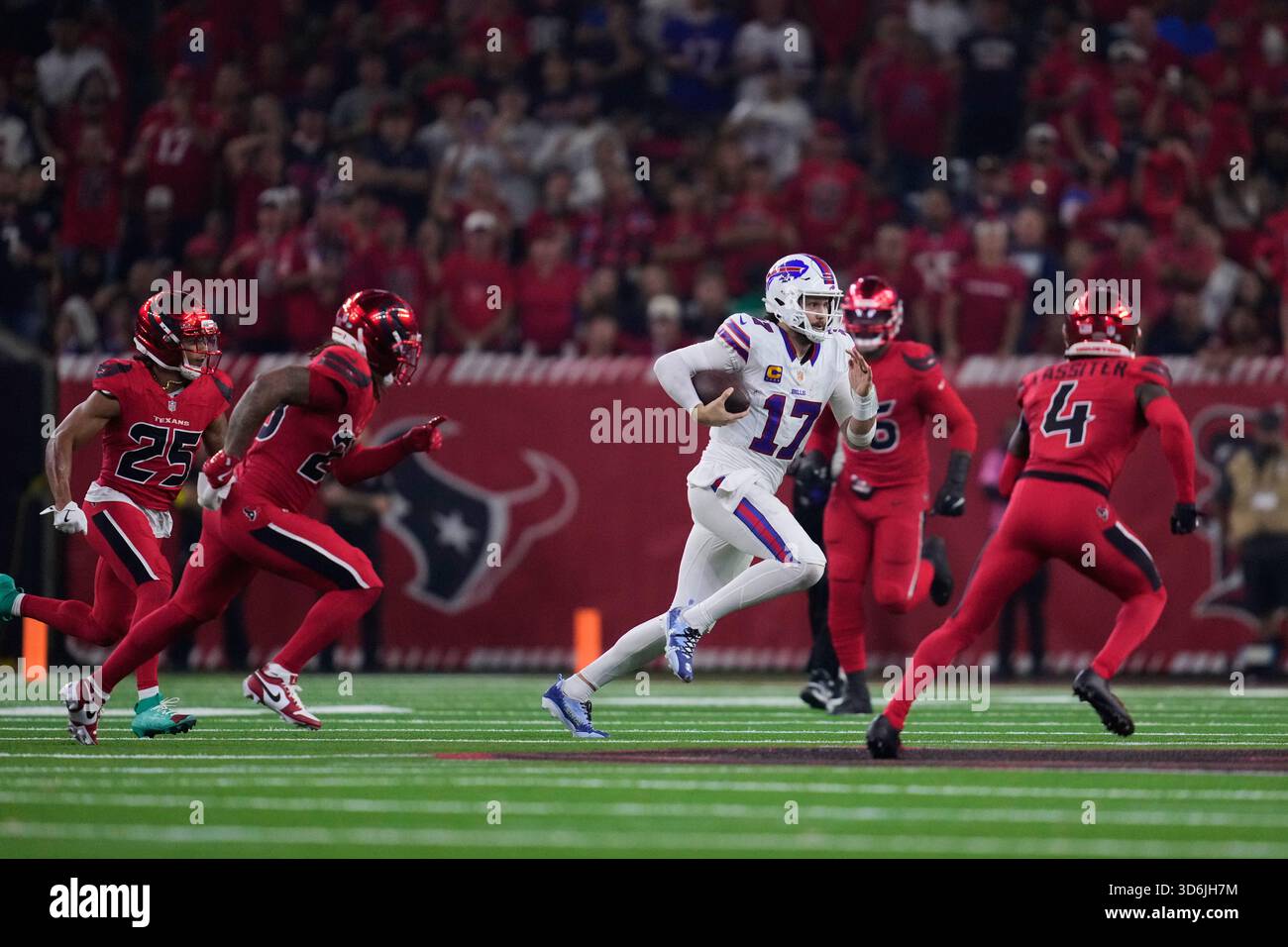 Buffalo Bills quarterback Josh Allen (17) scrambles under pressure from ...