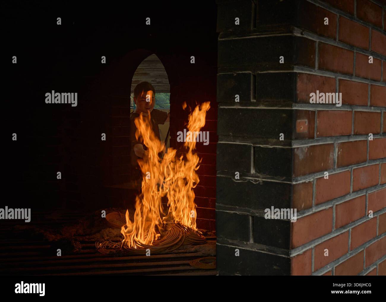 Malaysia. Kuala Lumpur. Chinese religion & culture. Man. Fire. Burn ...