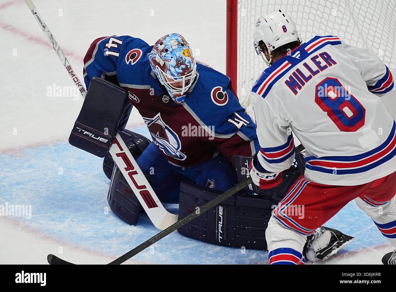 Colorado Avalanche goaltender Scott Wedgewood, back, stops a shot by ...