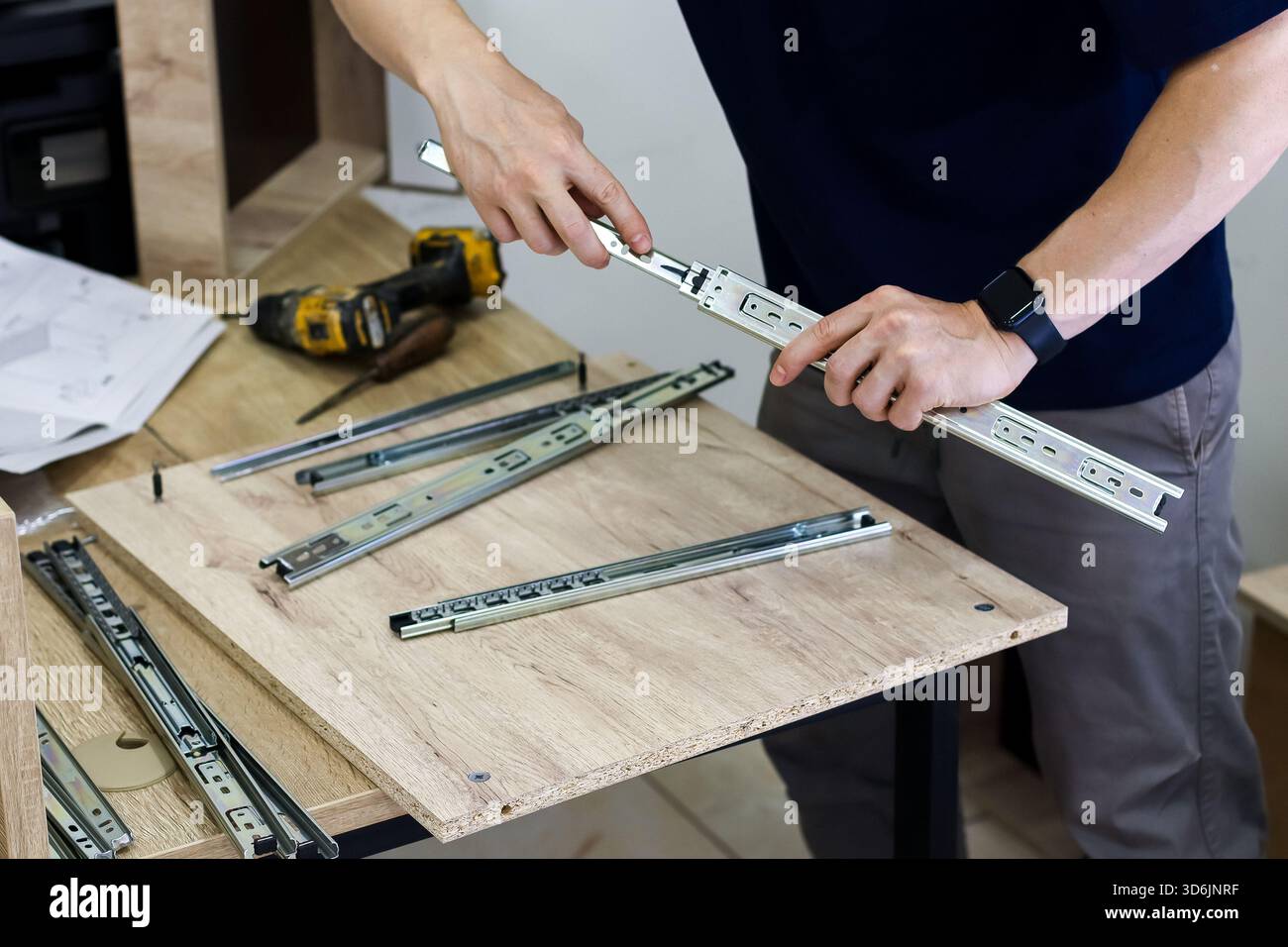 Aligning slide rail on drawer hi-res stock photography and images - Alamy