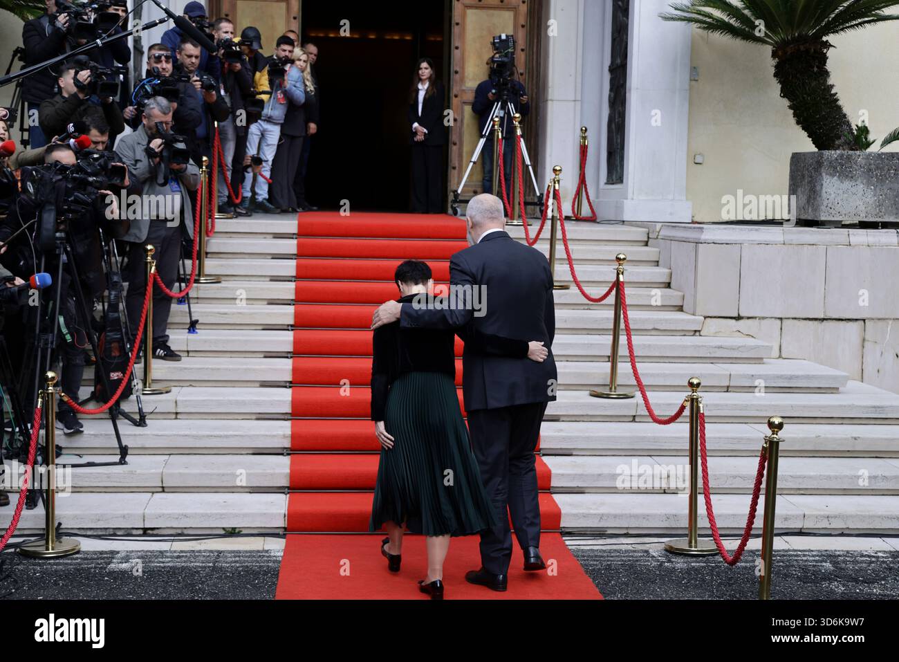 Albania's Prime Minister Edi Rama, right, greets EU Commissioner for Enlargement Marta Kos ...